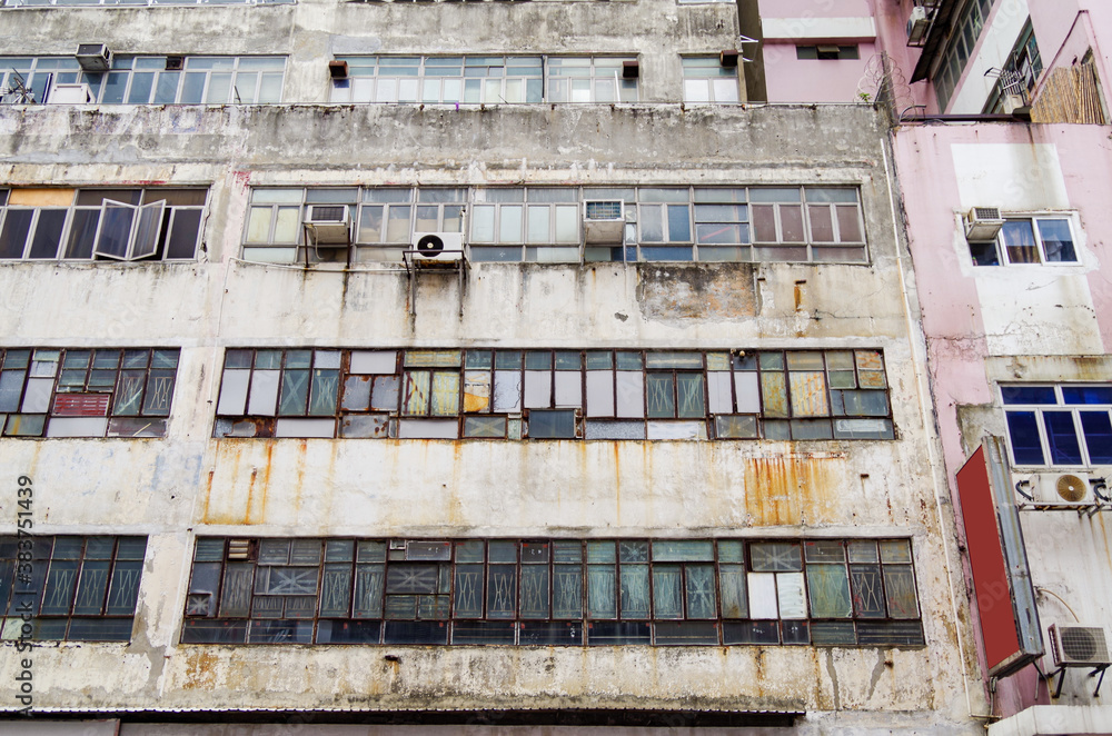Residential area in old apartment with windows. High-rise building ...