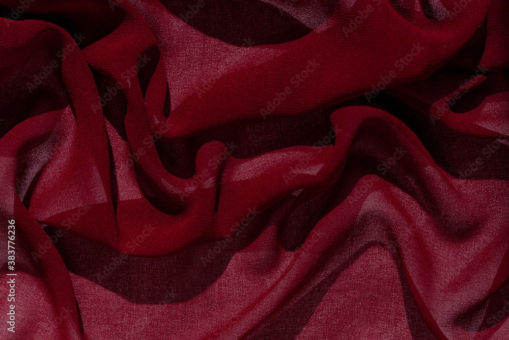 Smooth elegant burgundy chiffon fabric abstract background. Dark red ...