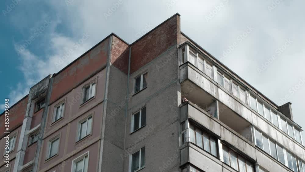 Authentic Soviet buildings, view of a gray residential building made of ...