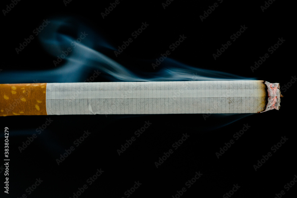 Lit cigarette Stock Photo | Adobe Stock