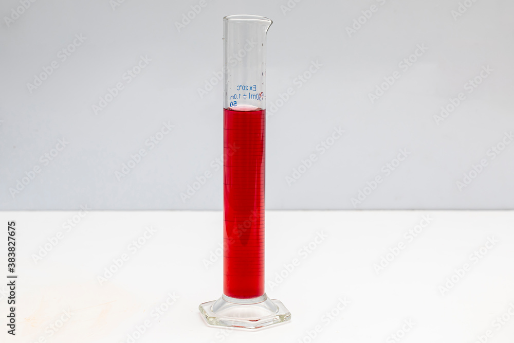 Chemical cylinder - lab glassware. Chemical measuring cylinder with ...