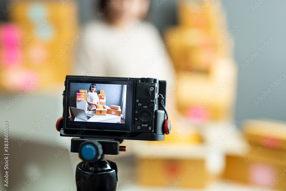 Two young woman recording video at shop. Stock Photo | Adobe Stock