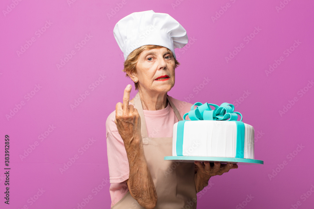 mature beautiful old woman feeling angry, annoyed, rebellious and ...