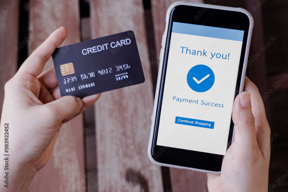 Online shopping, mobile payment. Woman hands holding credit card and ...