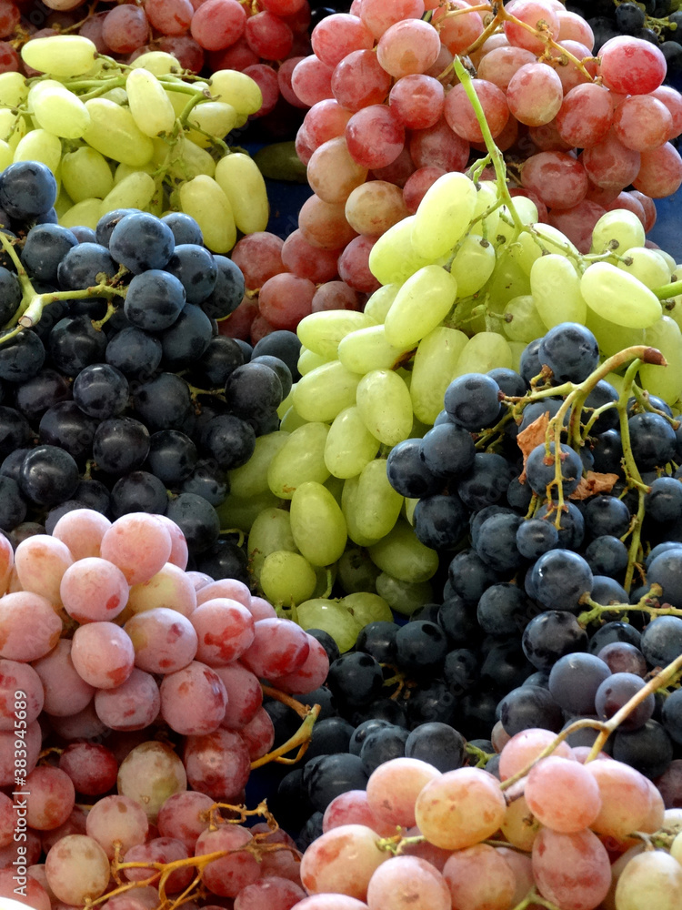 Colorful Turkish grapes on a farmers market stall in Ayvalik, Turkey ...