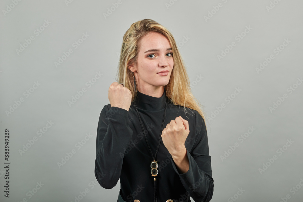 Angry and aggressive, shaking fist in a threatening way, domestic ...