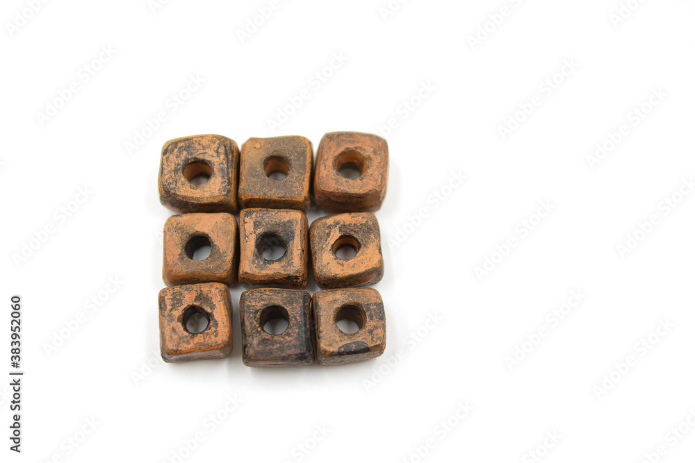 Ceramic bead made of baked clay square shape with blackening Stock ...