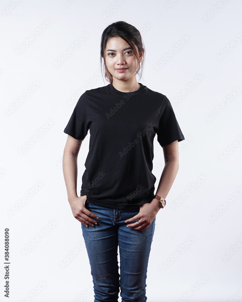 Front view black t-shirt Closeup on female body, woman girl in empty ...