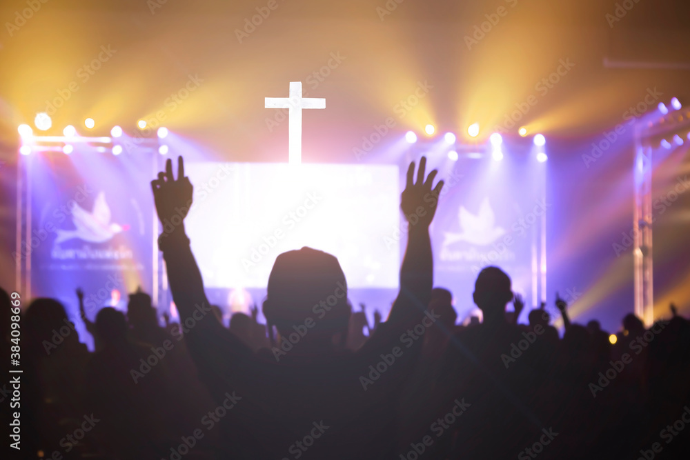 Church worship concept: Christian worship with raised hand at the at ...
