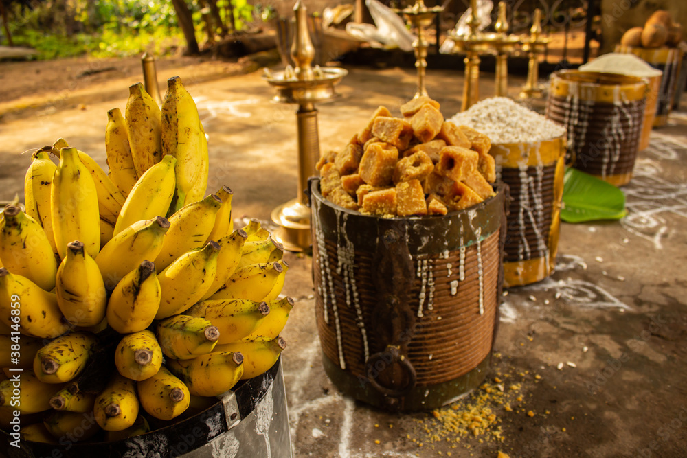 Selective focus of Banana, Sugar, Rice and other foods kept as offering ...