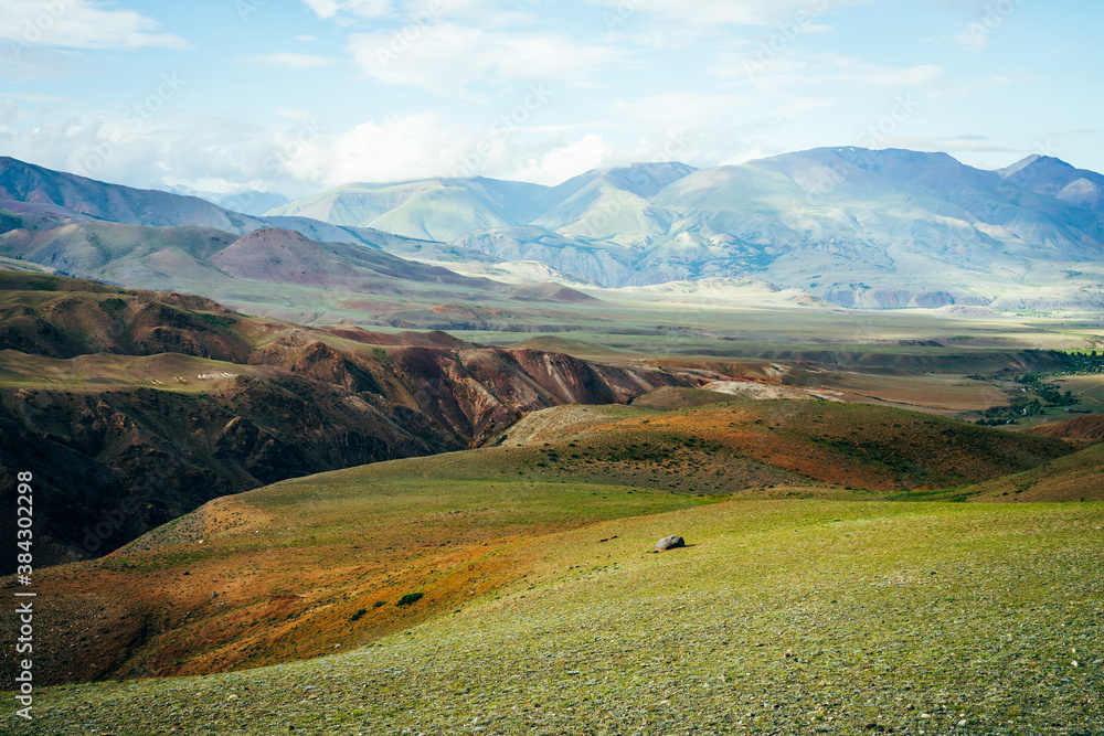 Awesome vivid mountain landscape with deep gorge. Multicolor mountains ...