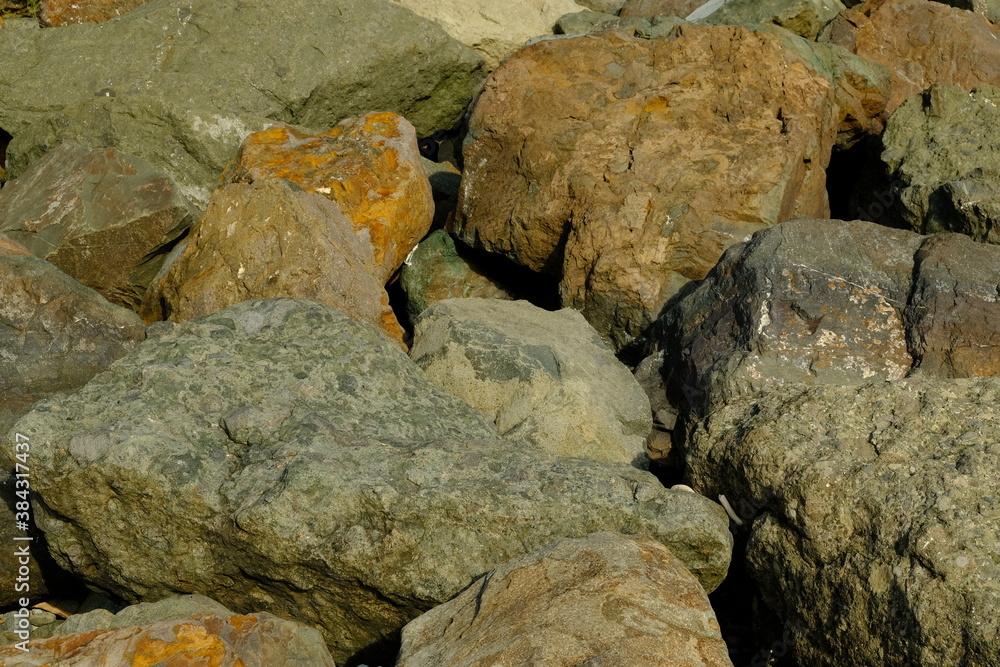Background from a stone of igneous rock. Wallpaper made of textures of ...