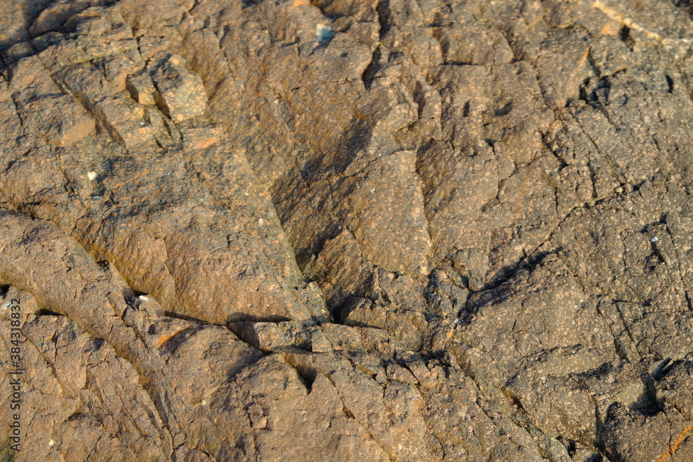 Background from a stone of igneous rock. Wallpaper made of textures of ...
