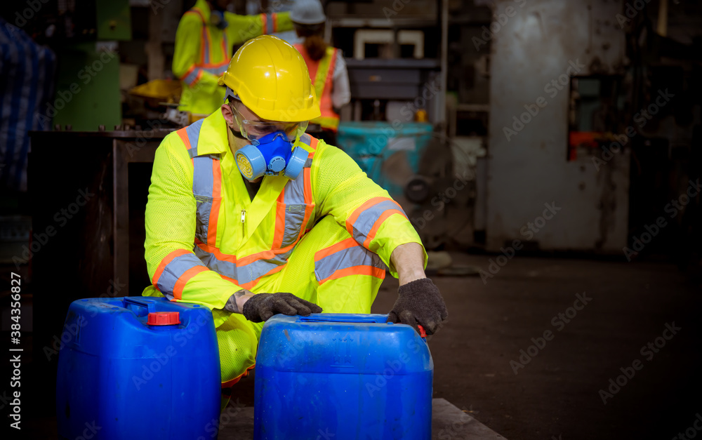 Engineer industry wearing safety uniform ,black gloves and gas mask ...