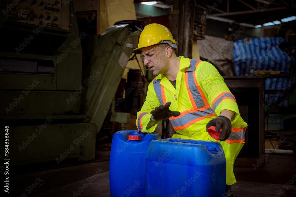 Engineer industry wearing safety uniform ,black gloves and gas mask ...