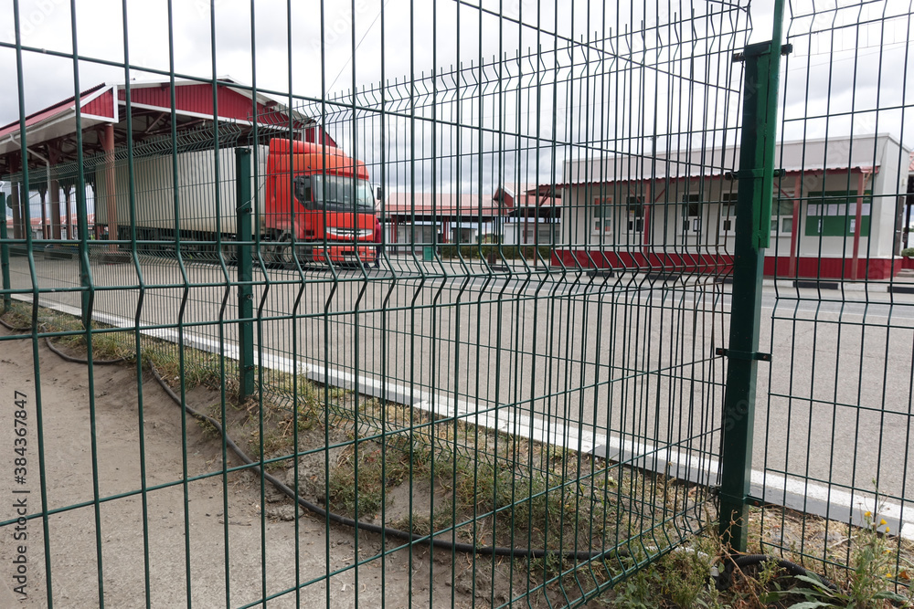 Foto de International border crossing point. A truck parked at the ...