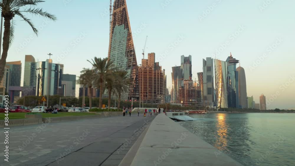 Doha corniche in Doha Qatar afternoon shot showing people walking ...