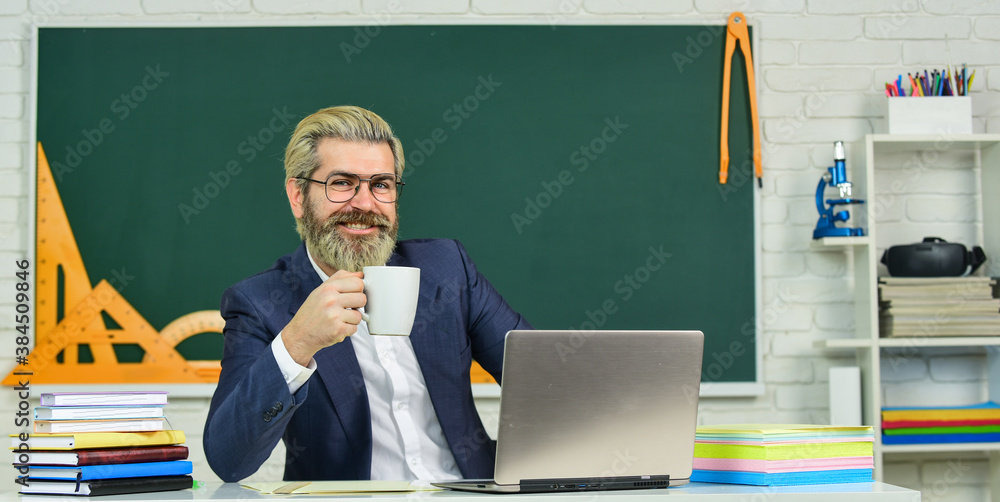 Want a cup. Bearded man relax drinking coffee in class. Thirsty teacher ...