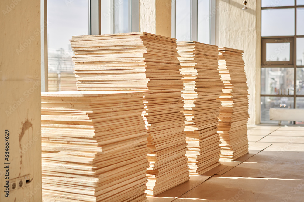 Plywood boards on the industry. layer of plywood, Construction site ...