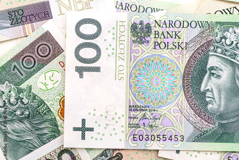 Macro photo of the front side of a Polish 100 PLN banknote, close-up on ...