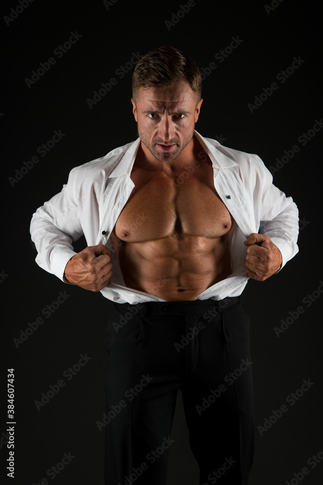 Strong man show fit abdominal muscles in open shirt formal style black ...