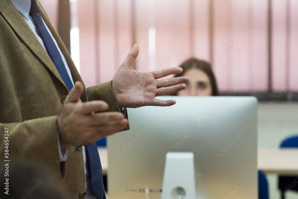 Selective focus on teacher while teaching and explaining lessons to ...