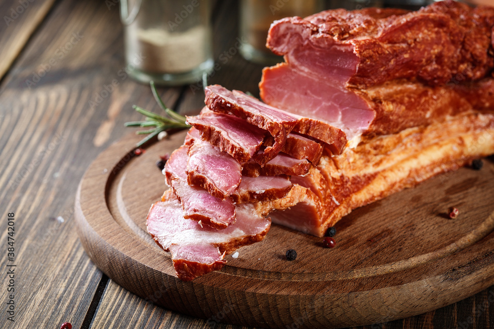 Smoked bacon with chopped slices, ready to prepare a traditional ...