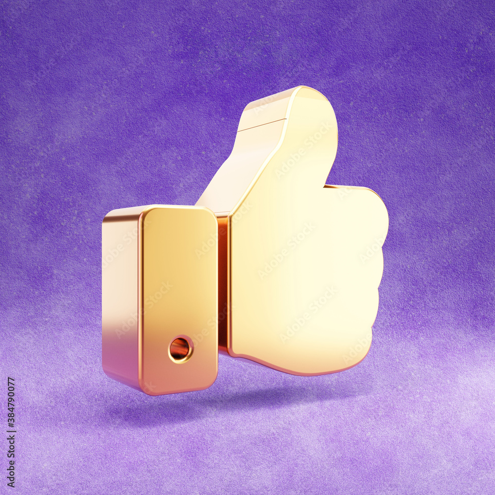 Thumbs up icon. Gold glossy Thumbs up symbol isolated on violet velvet ...