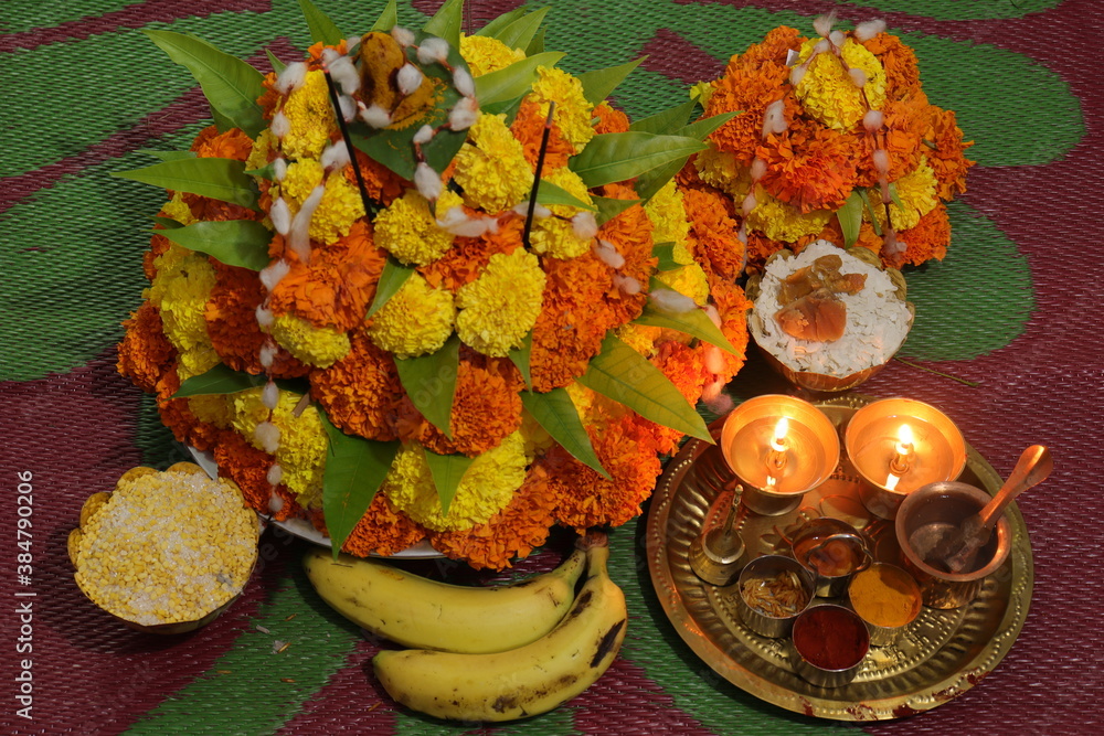 colorful flowers stacked up to create bathukamma, a specific hindu god ...