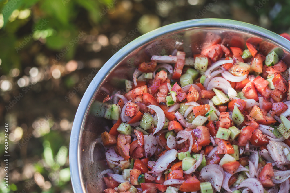 Shepherd salad mixed with minced onions tomatoes, peppers, cucumbers ...