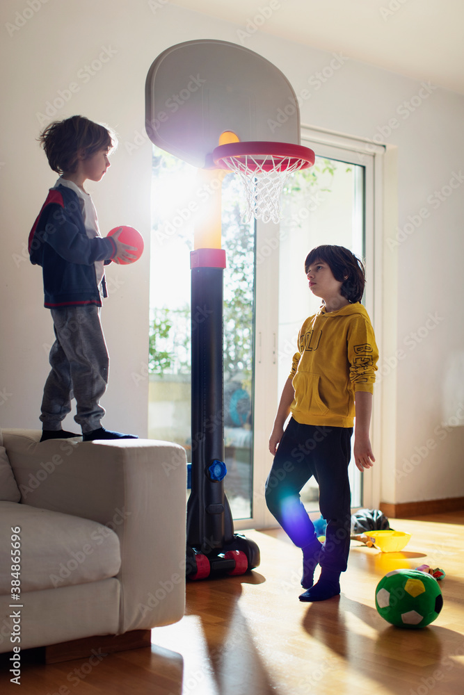 Kids playing basketball indoor Stock Photo | Adobe Stock