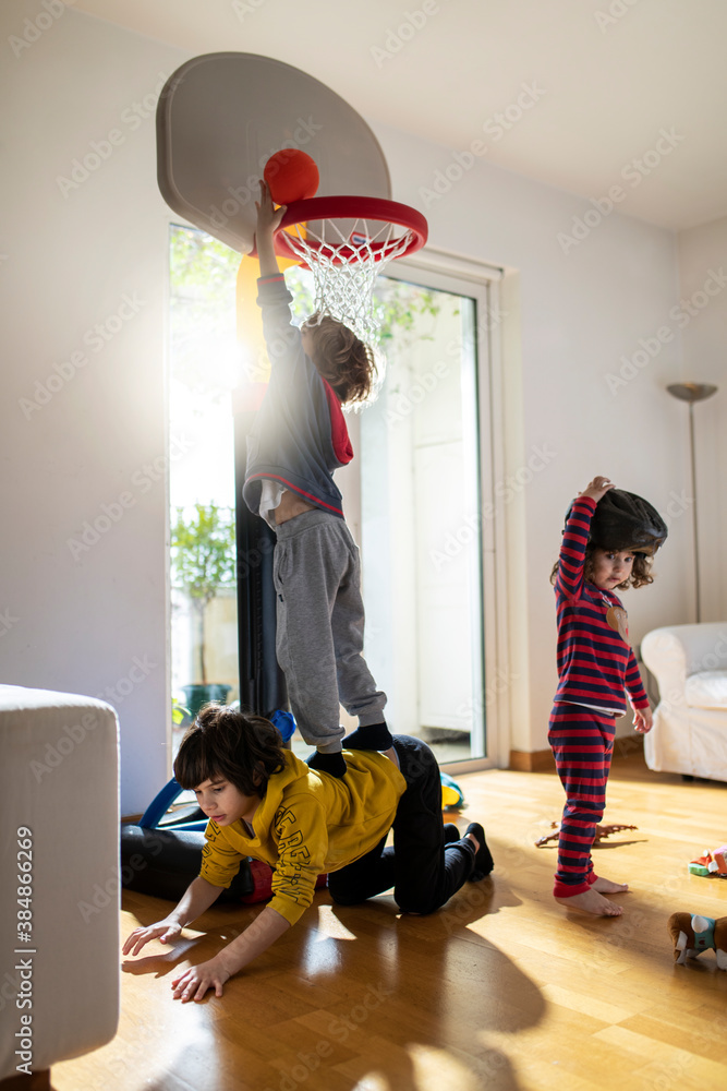 Kids playing basketball indoor Stock Photo | Adobe Stock