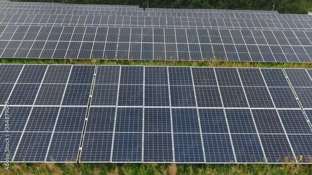 A solar panel station installed in a field to collect solar energy and ...