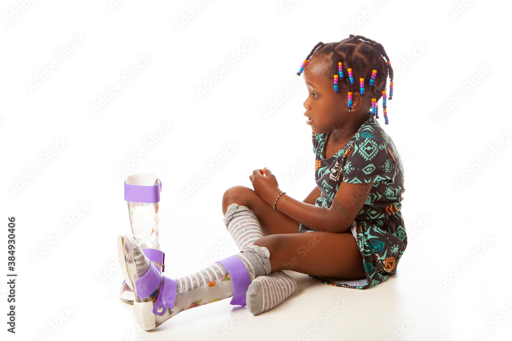 Black girl with Cerebral Palsy putting on her AFOs. Stock Photo | Adobe ...