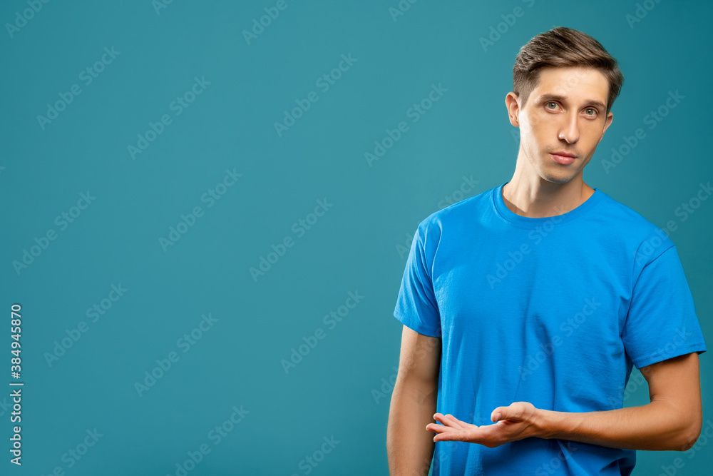 Confused man. Welcome gesture. Information banner. Young guy holding ...