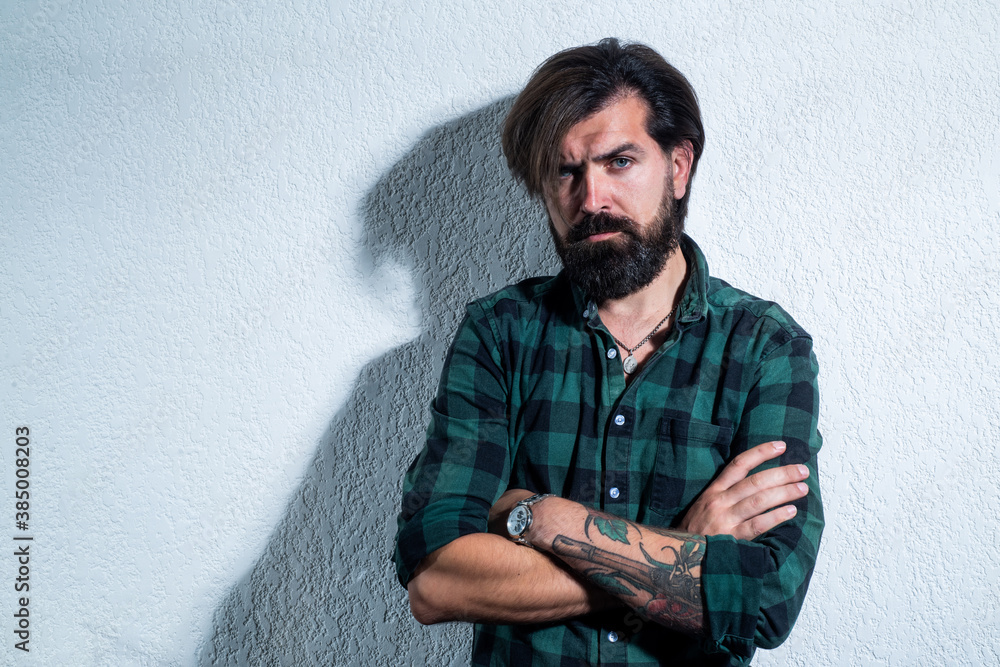 brutal handsome male with moustache and beard having stylish haircut ...
