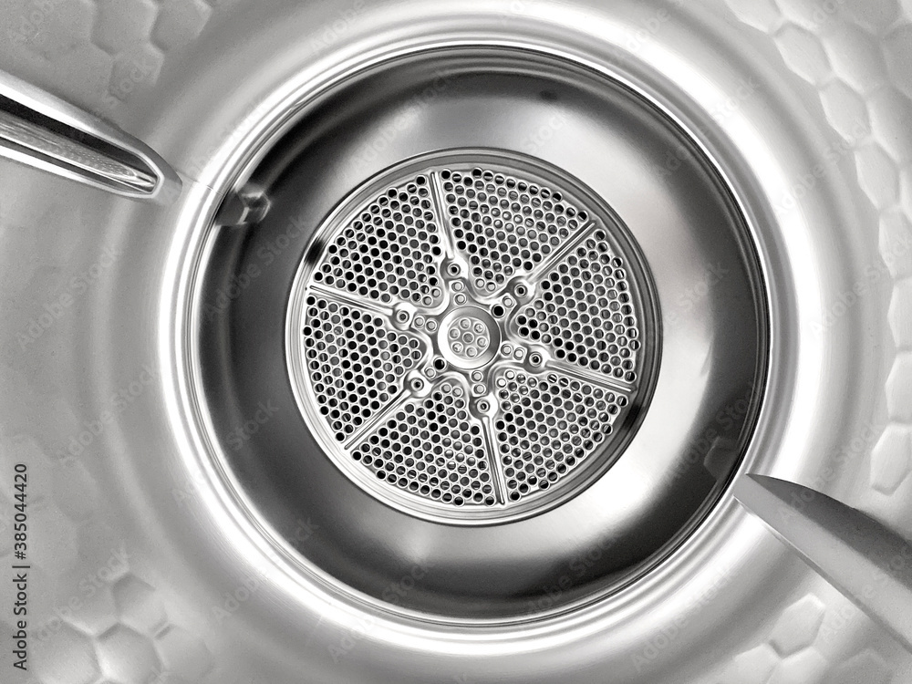 Interior view of the dryer. Metal surface texture. Conceptual for the ...