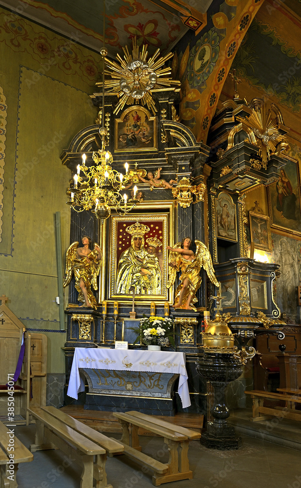 Interior of wooden All Saints' Parich Church in Sobolow. Church dates ...