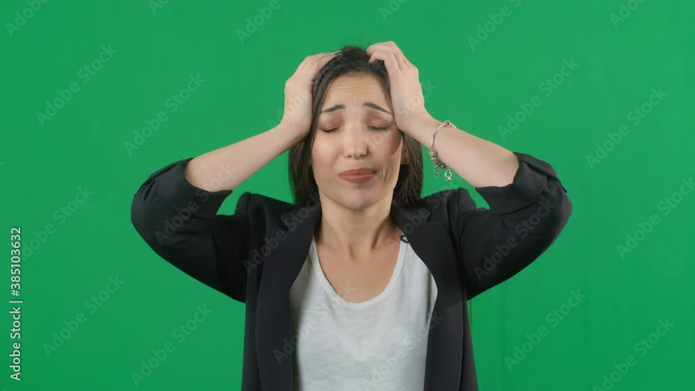 Horrible, stress, shock. Female portrait isolated at green screen ...
