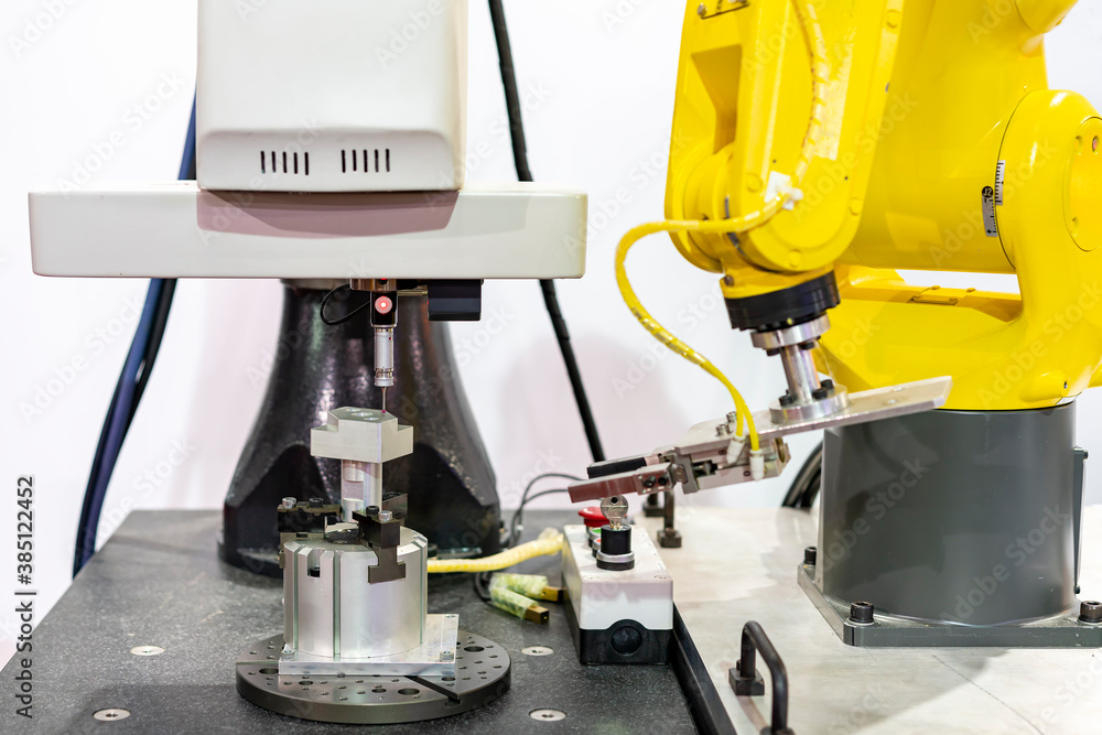 automatic coordinate measurement machine (CMM) during inspection ...