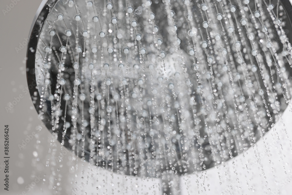 Water is pouring from the shower tap. Daily body hygiene concept Stock ...