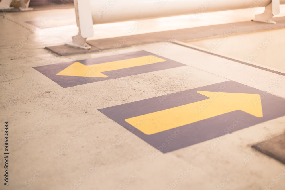 Floor detail with arrows. Concept of signals of new normal with social ...