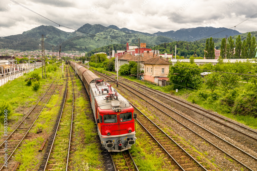 Aerial view of train on railway in the city of Brasov, Romania. Stock ...