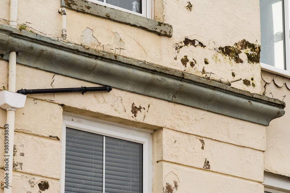 flaking peeling discoloured paint coatings to the exterior of a ...