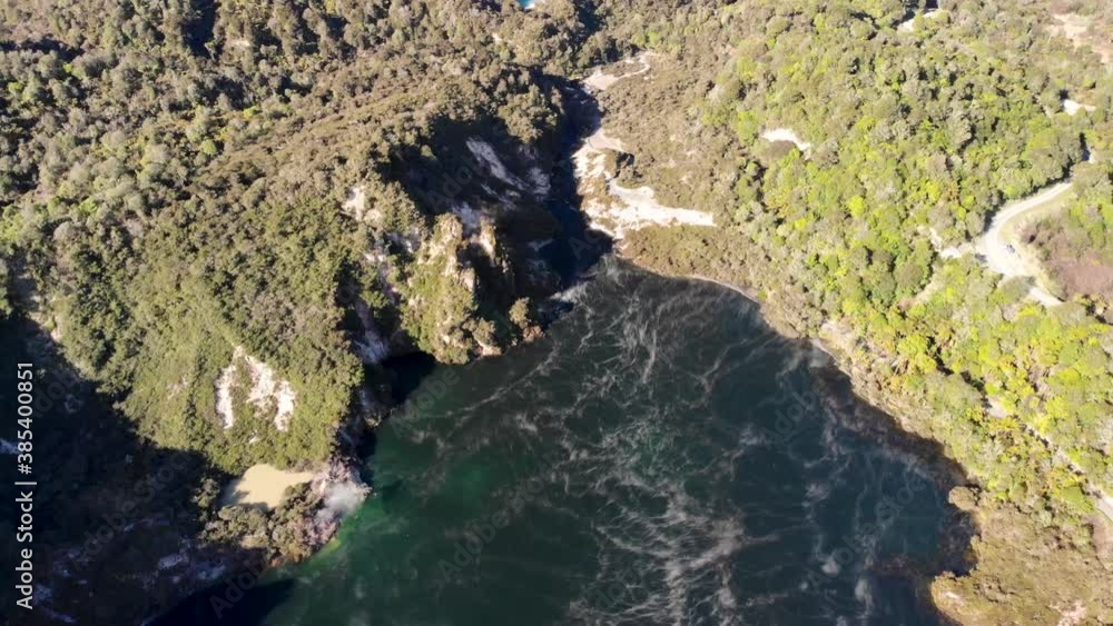 Frying Pan Lake in Waimangu Volcanic Valley, aerial reveal shot of huge ...