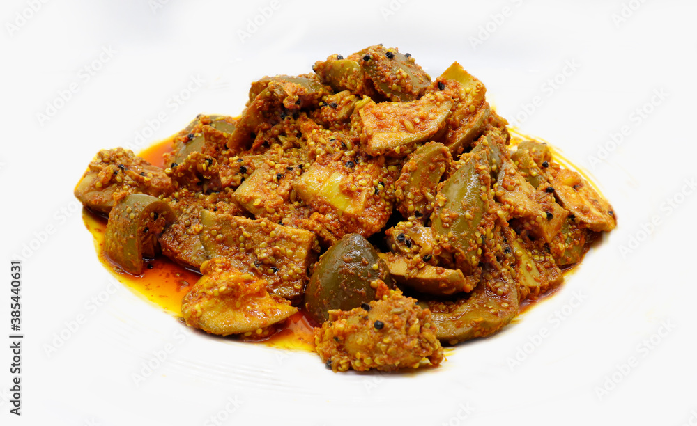 Homemade Mango Pickle or Aam ka Achar Or Kairi Loncha on white ...