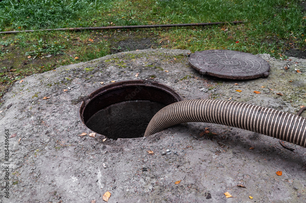 pipe placed in a manhole Stock Photo | Adobe Stock