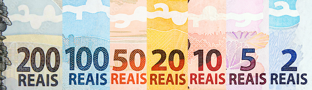 banknotes of money of brazil, in composite. Details of notes of 200 ...