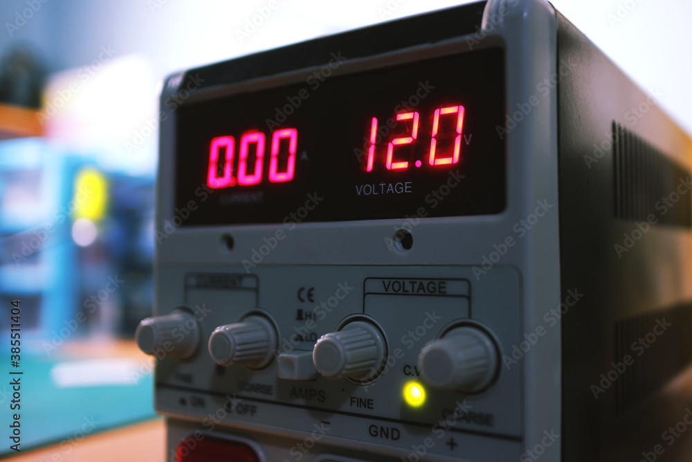 Adjustable Power Supply On Working Table, The Voltage Set To 12 Volt ...
