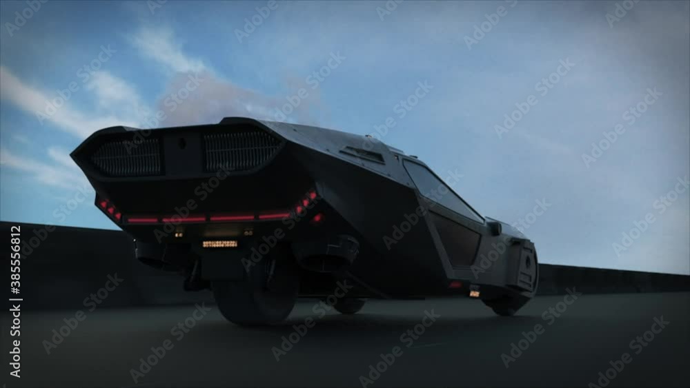 The rear of a black futuristic electronic car speeding down the road ...